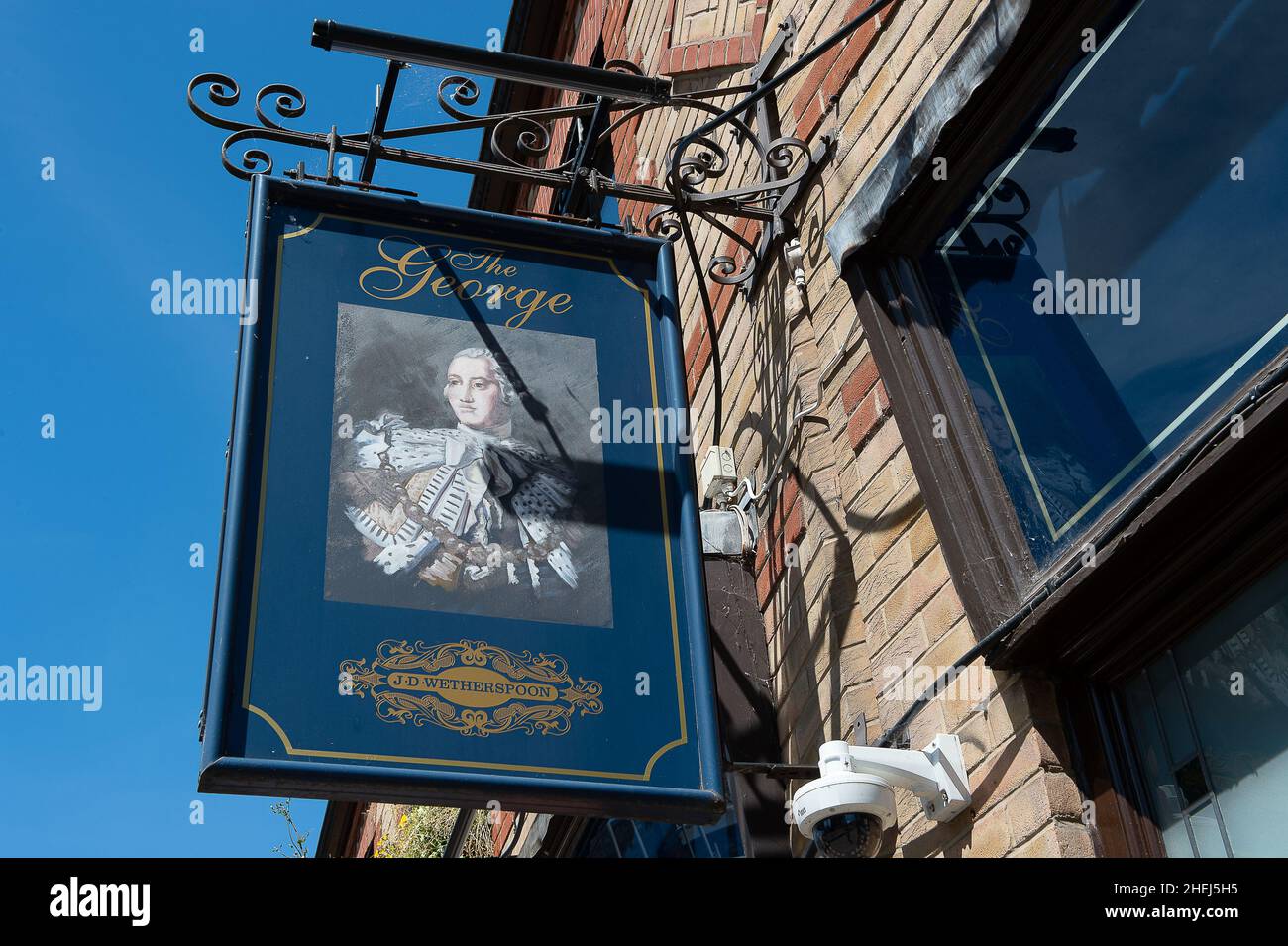 Staines-upon-Thames, Surrey, UK. 20th May, 2020. A sign outside the J D ...