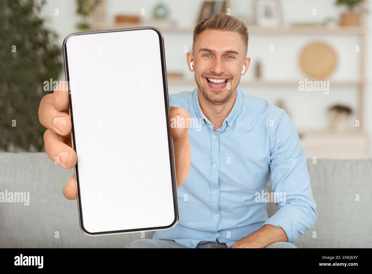 Mobile Ad. Excited Happy Man Showing Smartphone With Blank White Screen ...