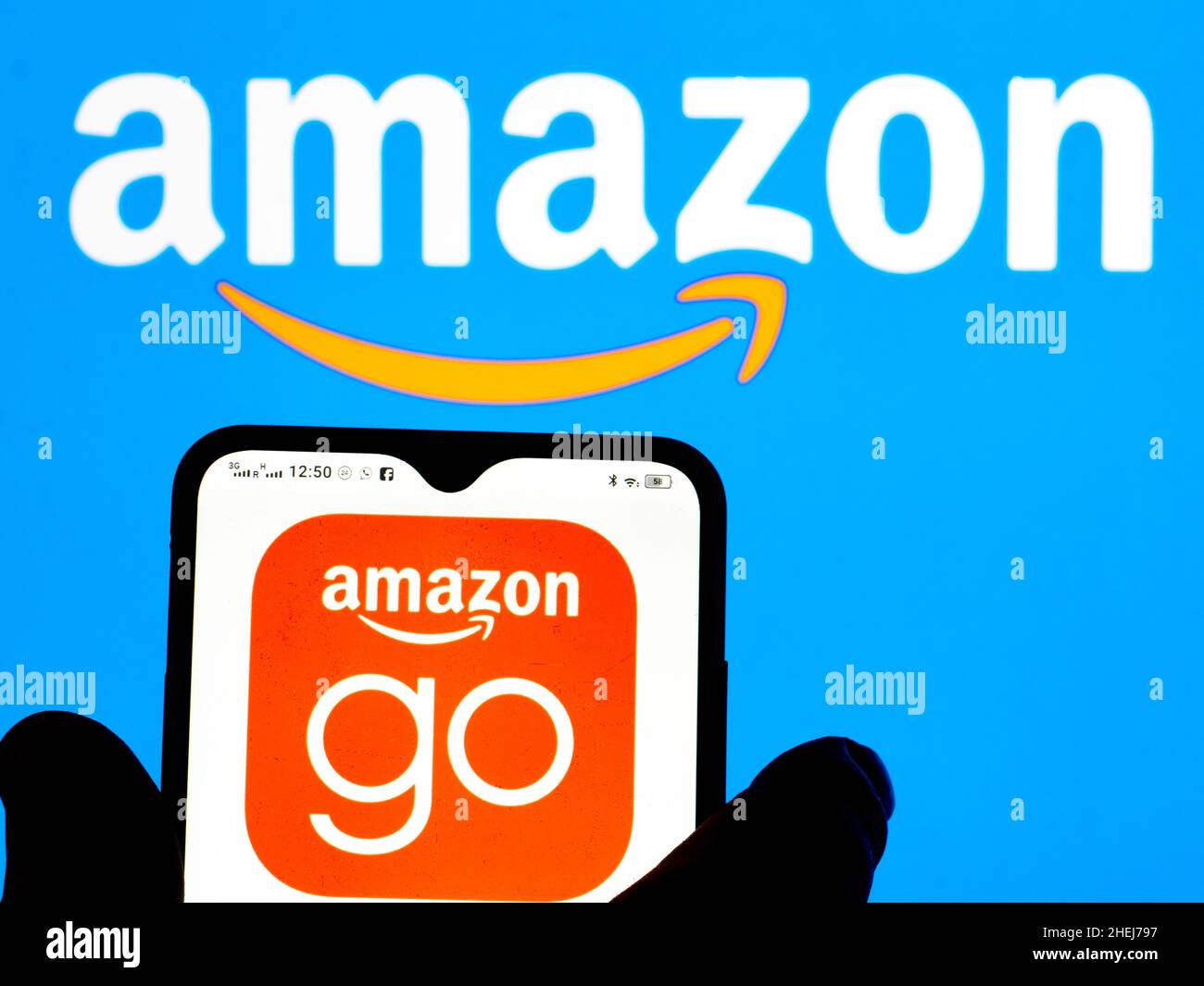 In this photo illustration Amazon Go logo seen displayed on a ...