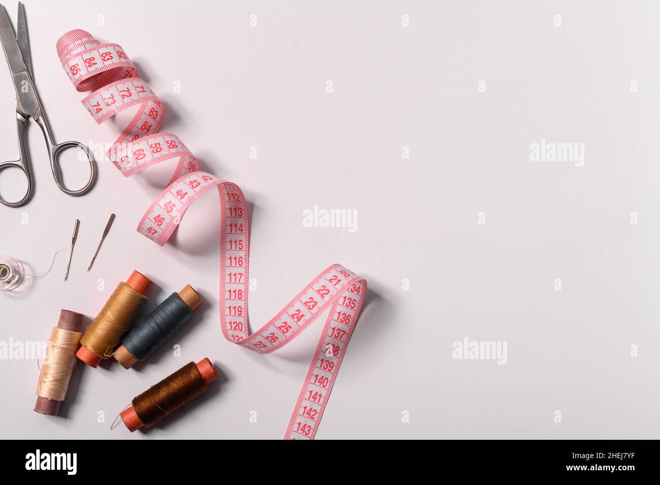 sewing tools on a white background. space empty Stock Photo - Alamy