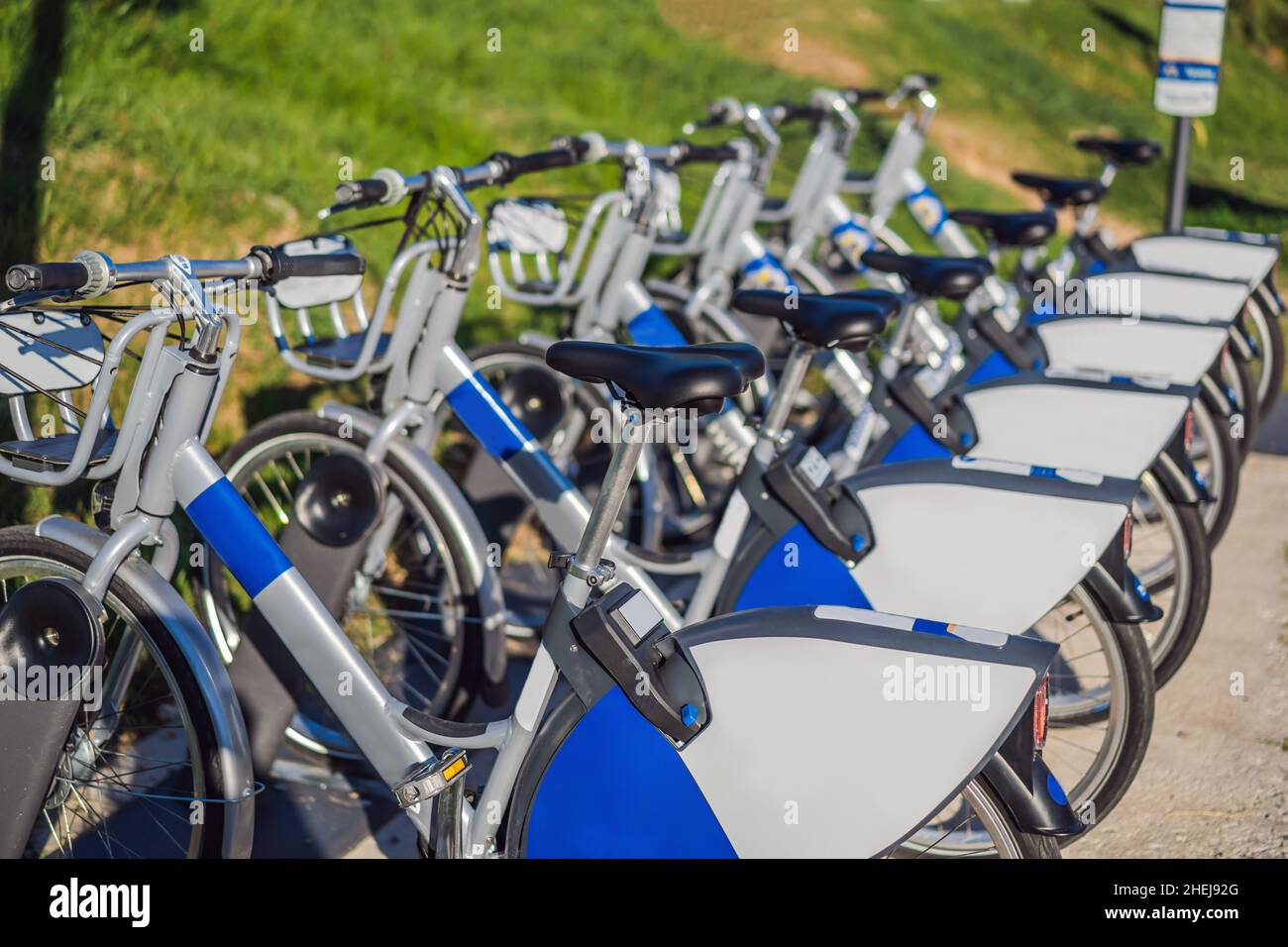 City bike parking. Bicycles for rent on city Stock Photo - Alamy