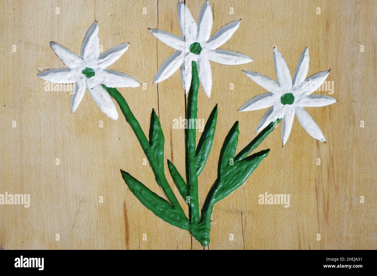 Wooden edelweiss hi-res stock photography and images - Alamy