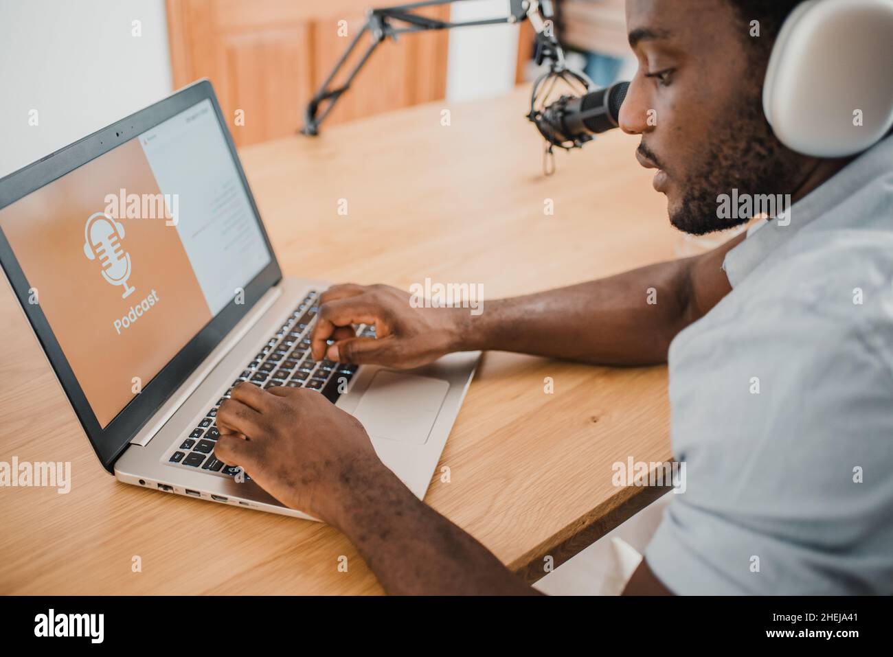 Man using microphone headphones recording hi-res stock photography and ...