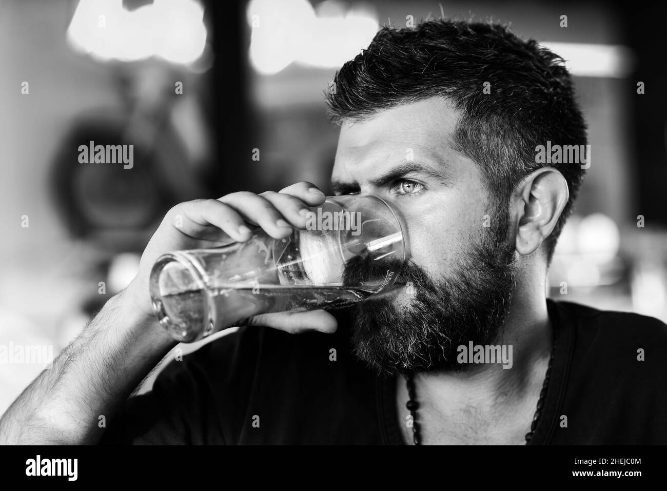 Man good health drink Black and White Stock Photos & Images - Alamy