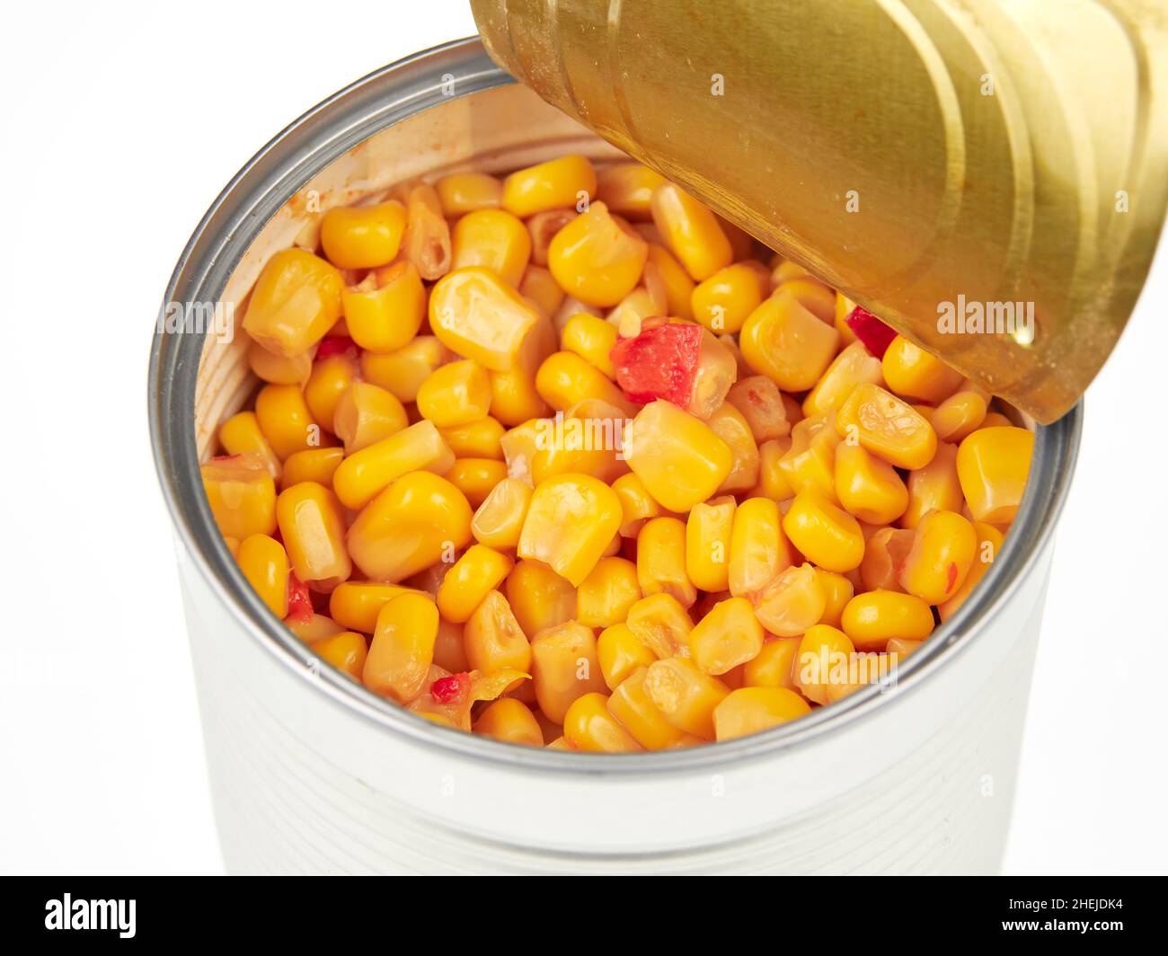 A can of mexican-style sweet corn kernels with pieces of bell peppers ...