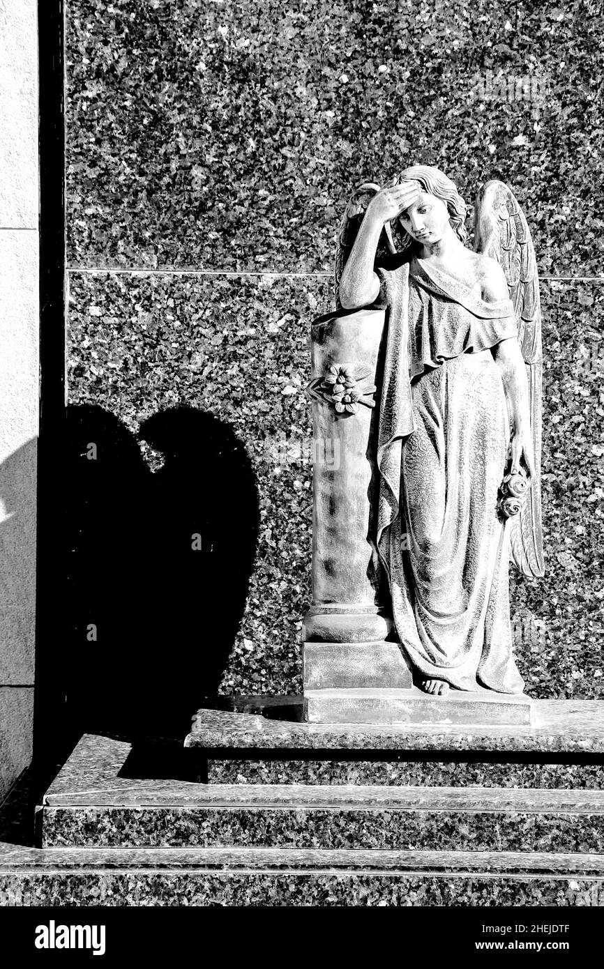 Metal Angel statue in a lonely cemetery in Spain Stock Photo - Alamy