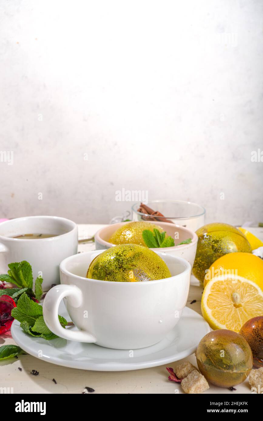 Various tea ball bombs. Assortment of different tea balls with dried ...