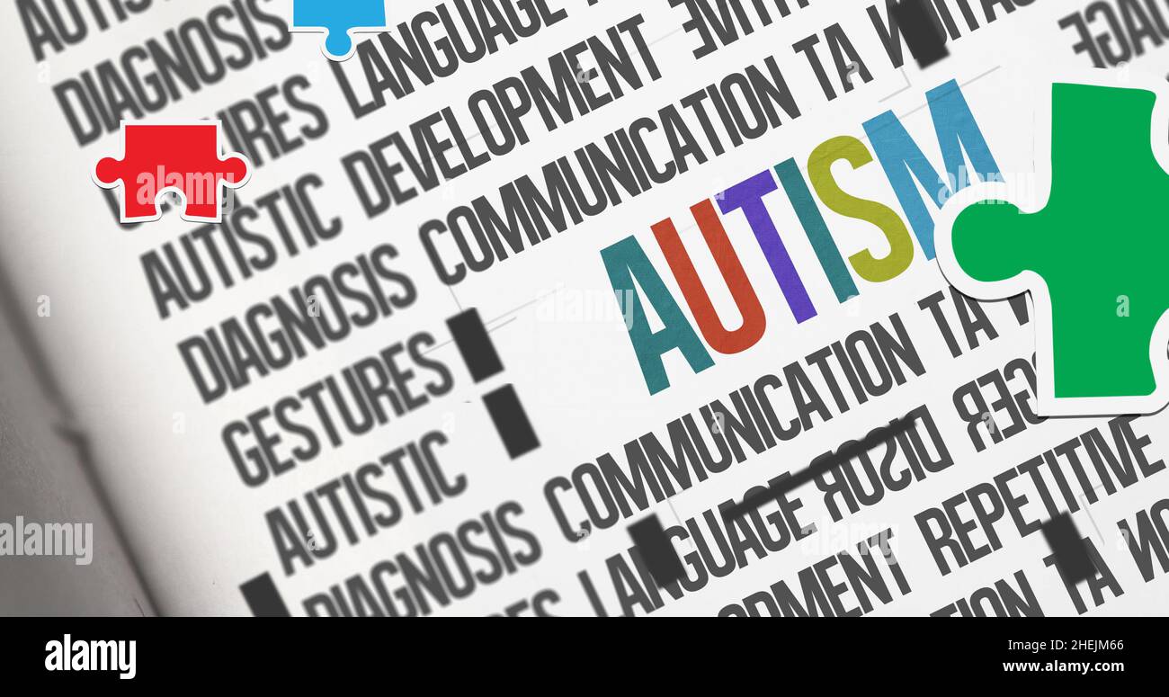 Image of red, green and blue autism awareness puzzles falling over ...