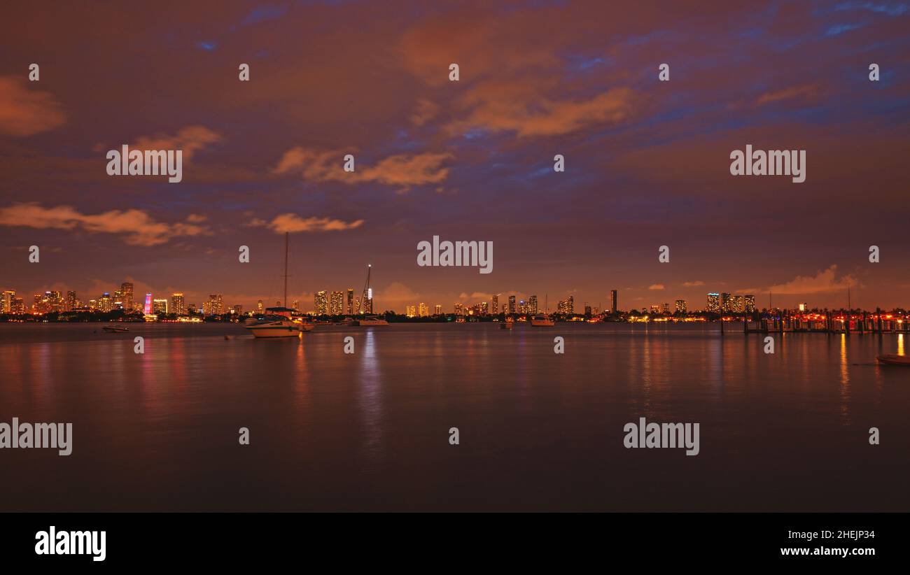Miami at sunset. Miami Florida, colorful skyline of Macarthur causeway ...