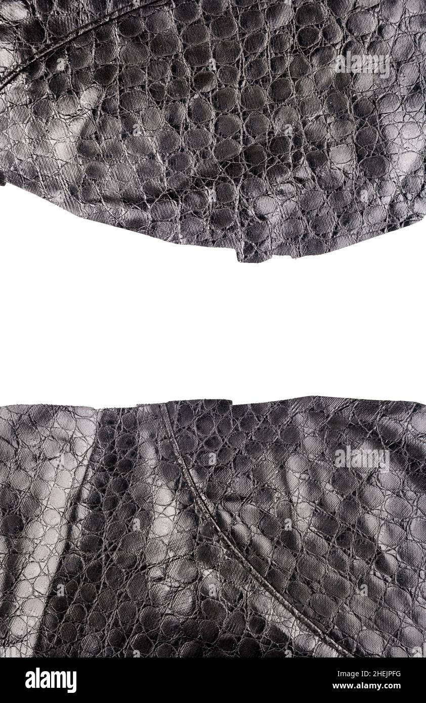 Two pieces of black artificial leather with a space for text isolated ...