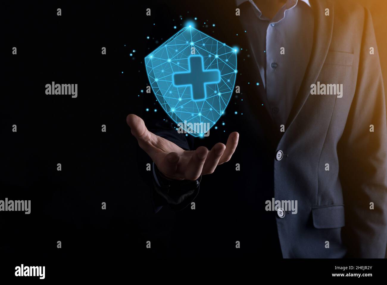 Businessman hold Shield with plus Low polygonal icon, medicine icon ...