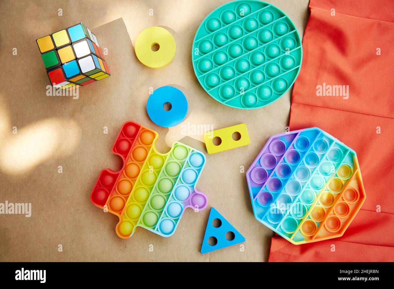 New trendy silicone toy. Rainbow sensory fidget. Colorful antistress ...