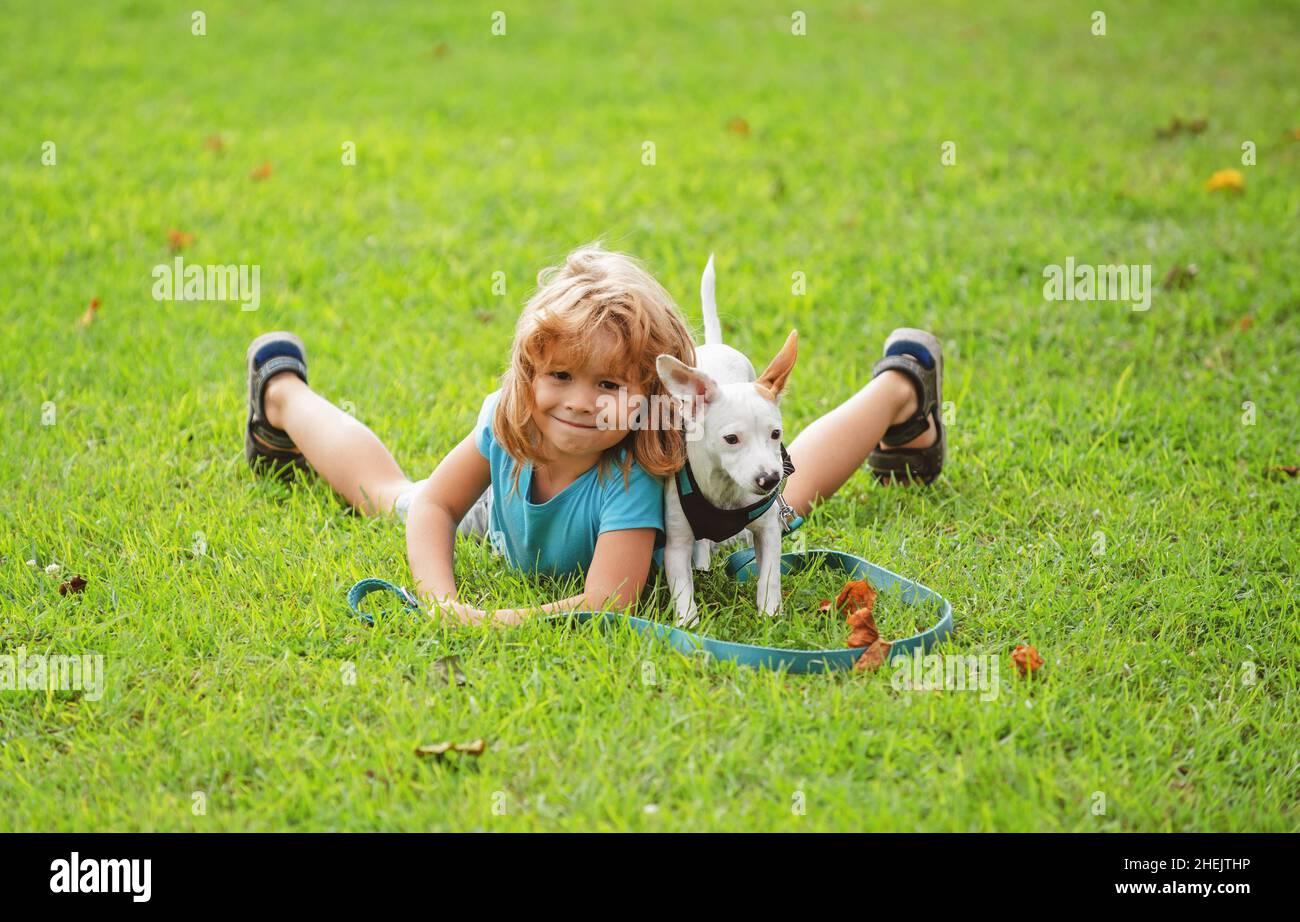 Children boys kids walking the dog hi-res stock photography and images ...