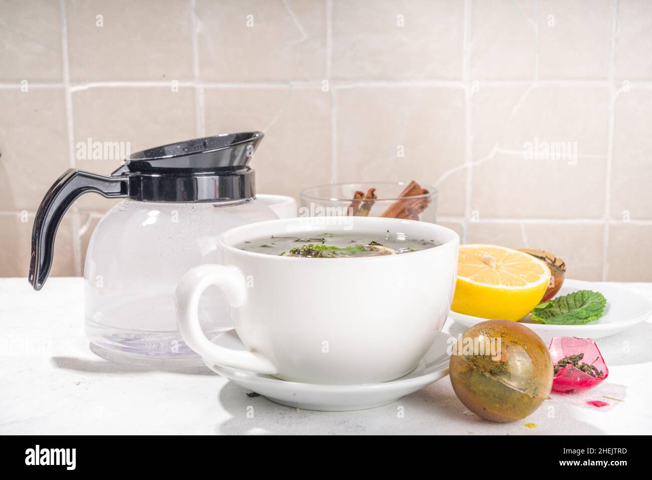 Making tea with Trendy modern tea ball bombs. Tea balls with dried tea ...