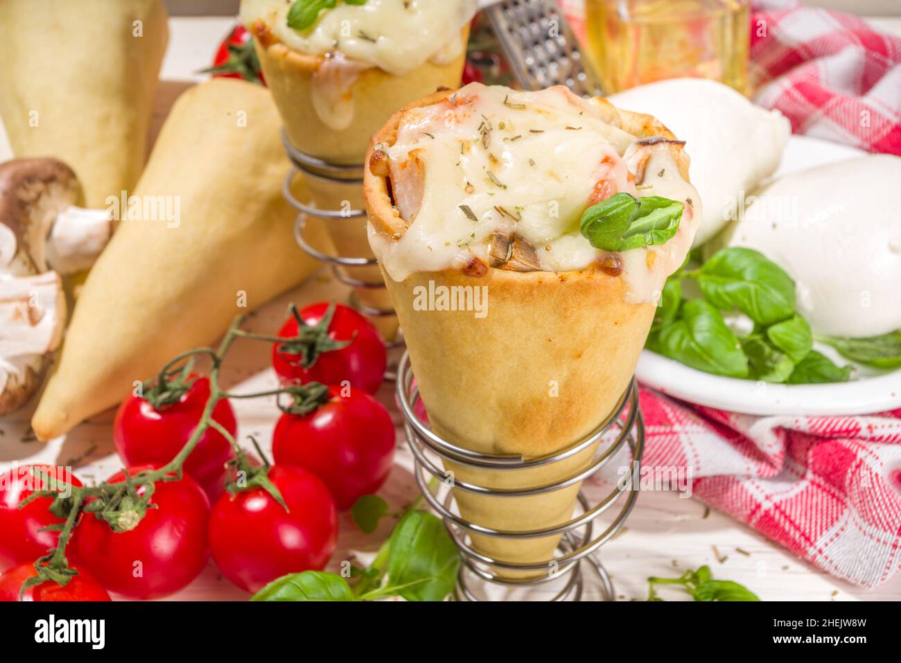 Trendy Cone pizza, modern pizza recipe, with tomatoes, basil ...