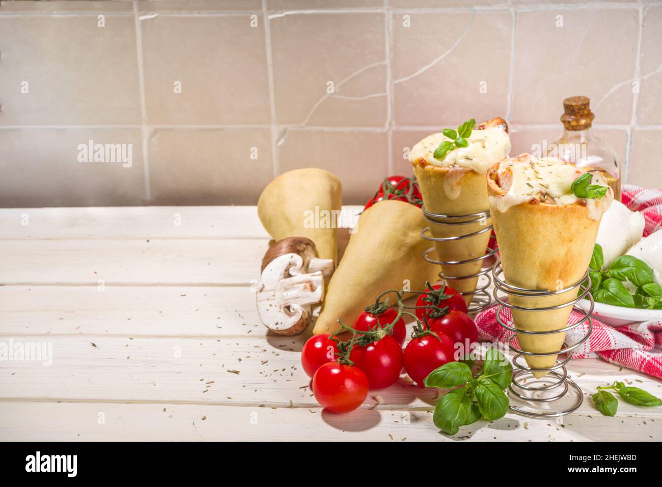 Trendy Cone pizza, modern pizza recipe, with tomatoes, basil ...