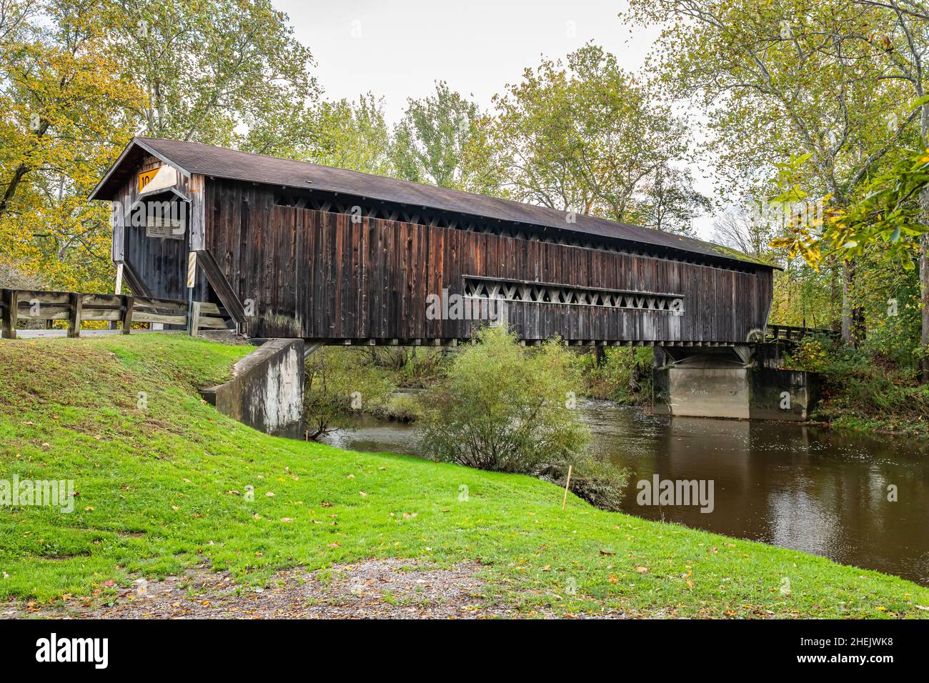 The Benetka Road Covered Bridge crosses the Ashtabula River during the ...