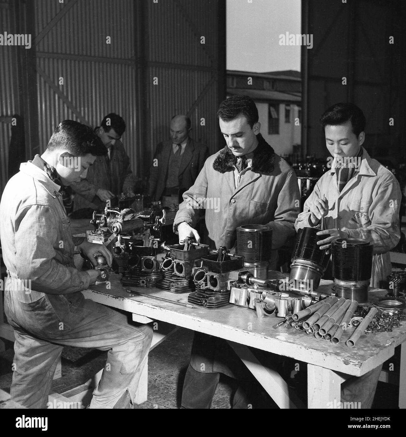1950s, historical, inside an aircraft hanger, foreign aerospace ...