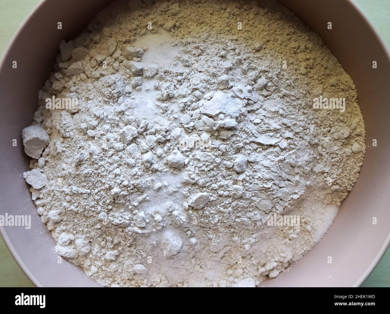 Fresh wheat flour in a light bowl taken from above Stock Photo - Alamy