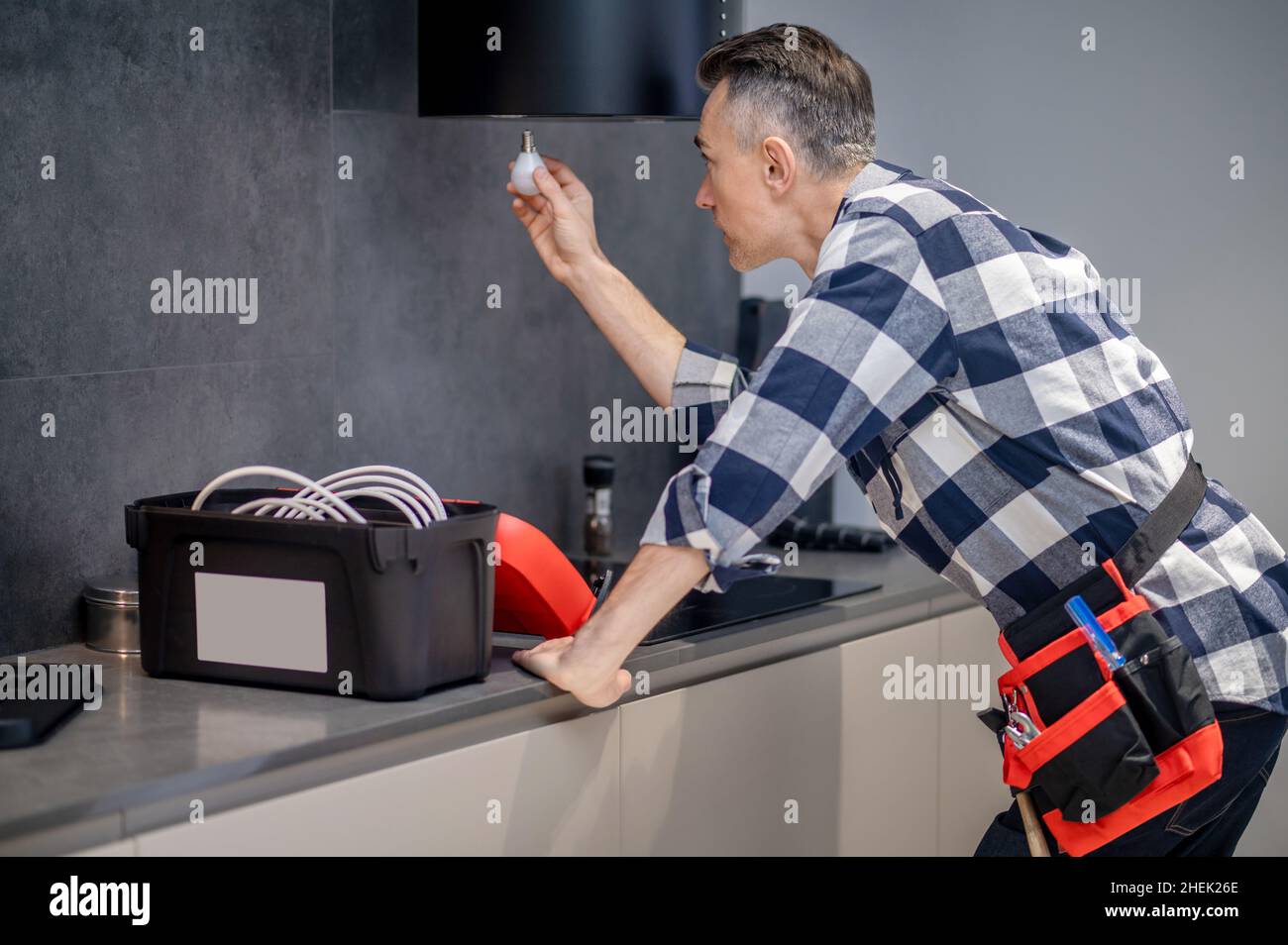 Man with lamp hi-res stock photography and images - Alamy