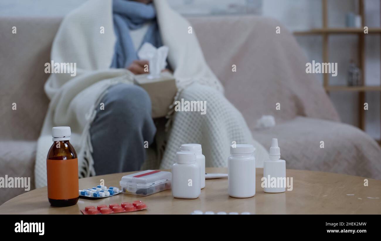 Sick man sitting near table hi-res stock photography and images - Alamy