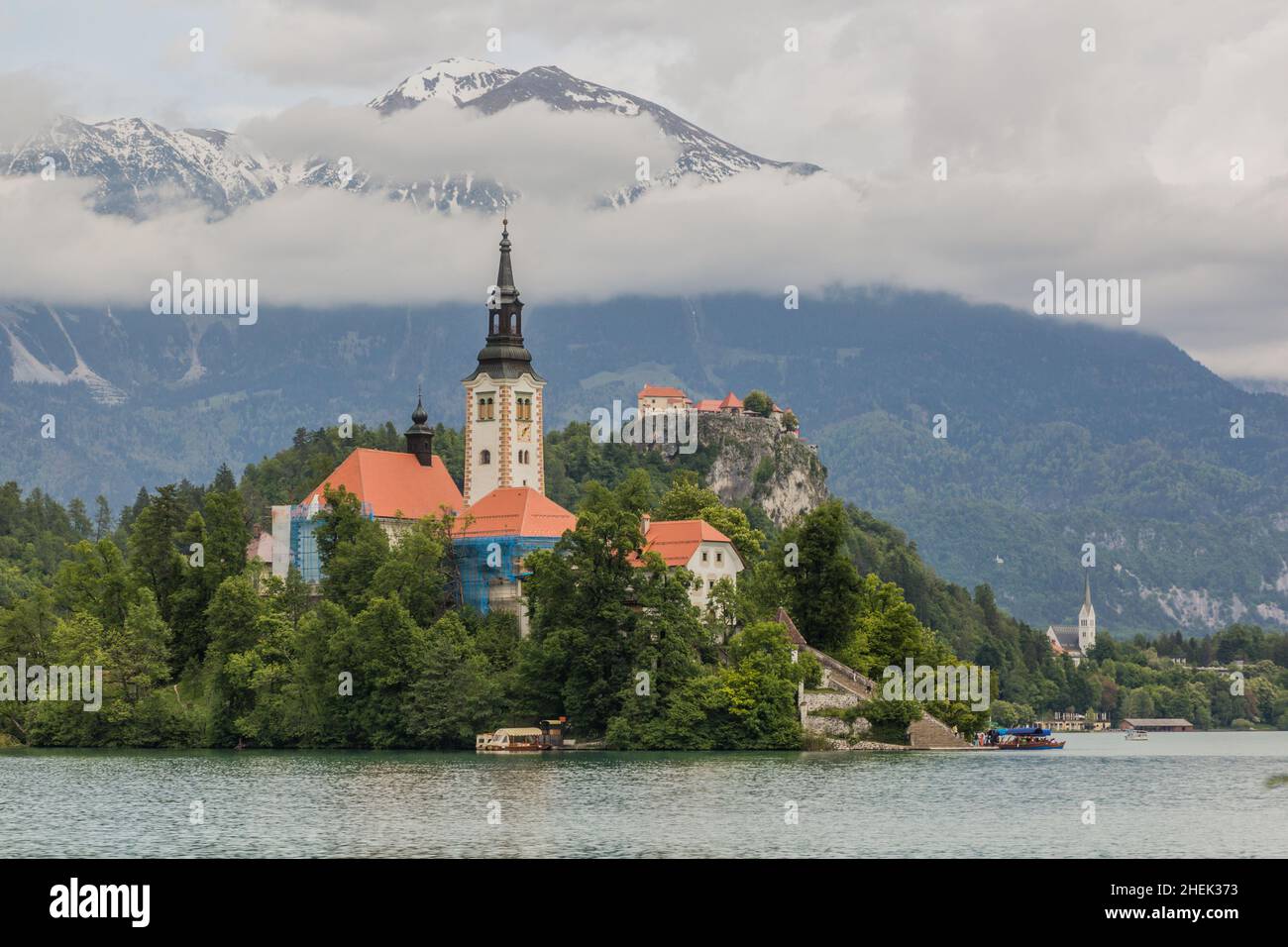 Karawanks mountain range behind Bled lake with the Pilgrimage Church of ...