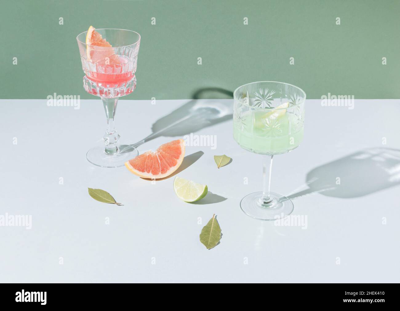 Minimal arrangement with cristal glasses and grapefruit and lime slices ...