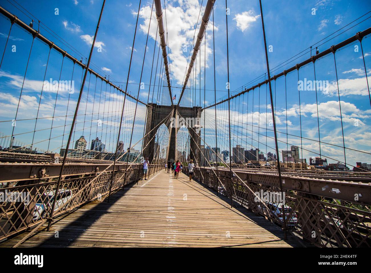 The Manhattan Bridge is a suspension bridge that crosses the East River ...