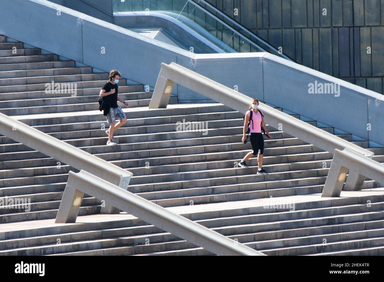 Going down the stairs Stock Photo - Alamy