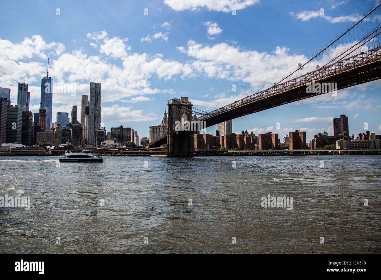 The Manhattan Bridge is a suspension bridge that crosses the East River ...