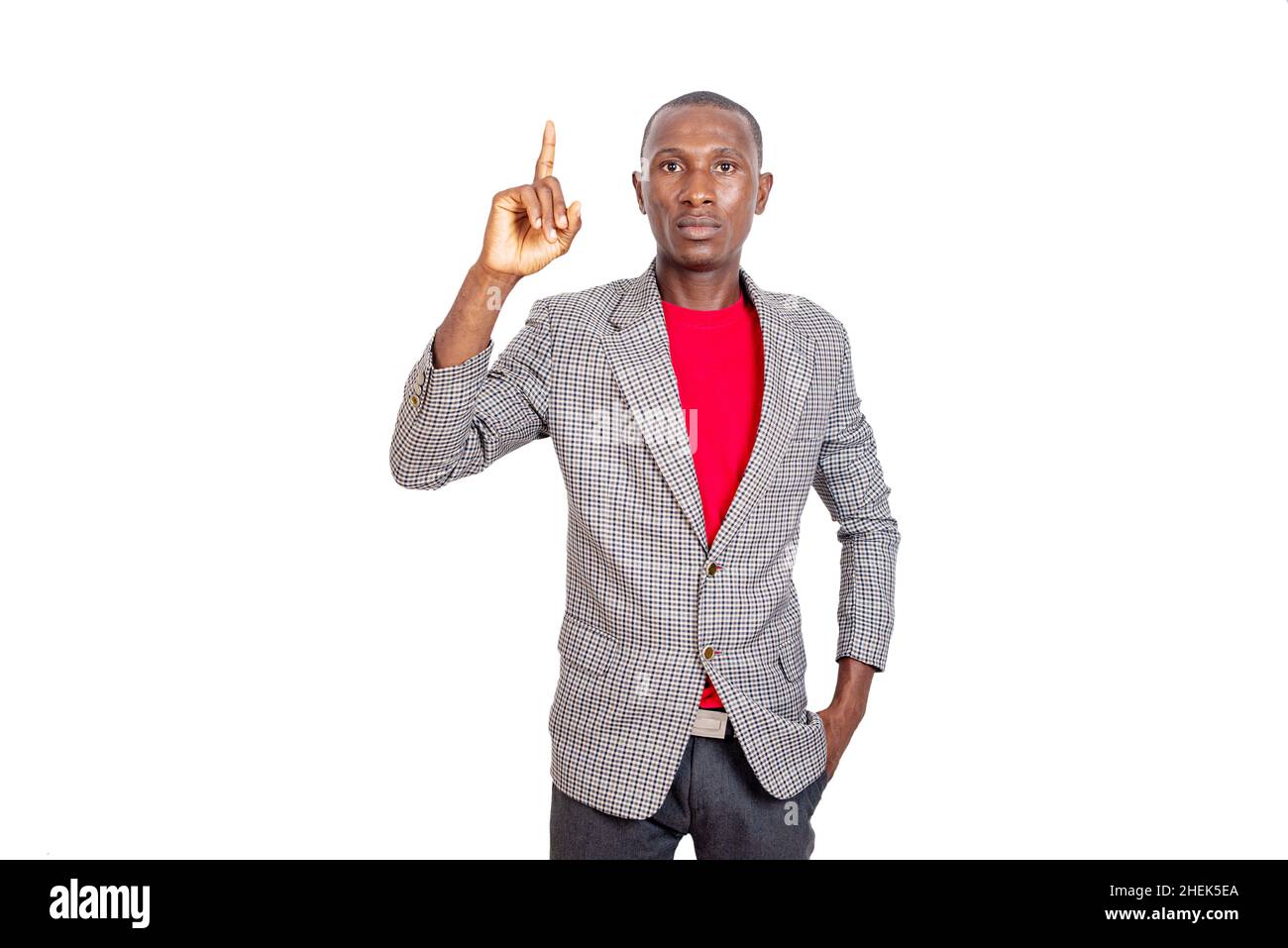 portrait of an adult businessman pointing the finger up and looking at ...