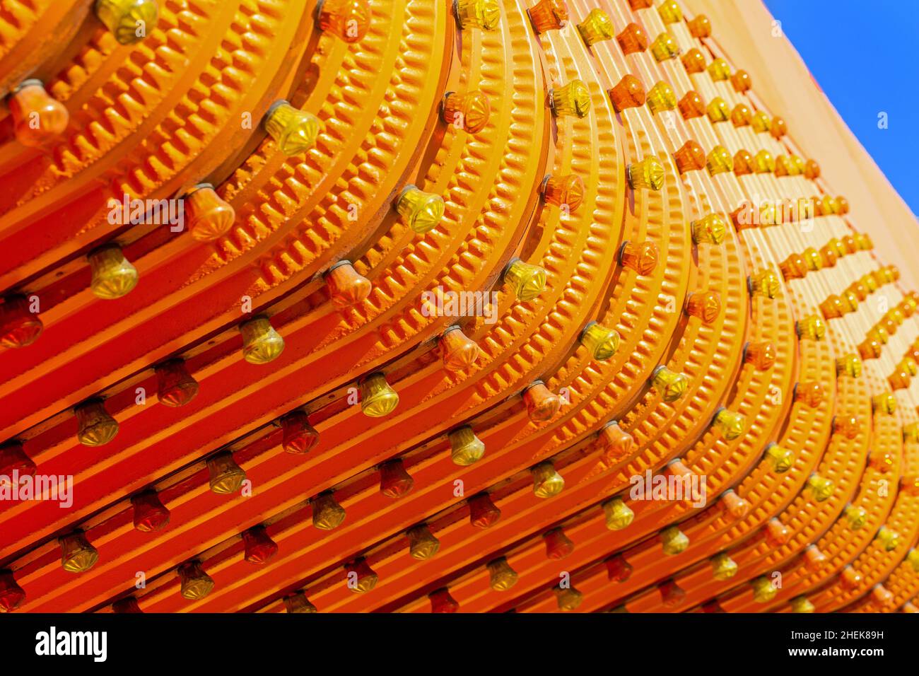 Close up shot of the orange moulded roof of an amusement arcade Stock ...