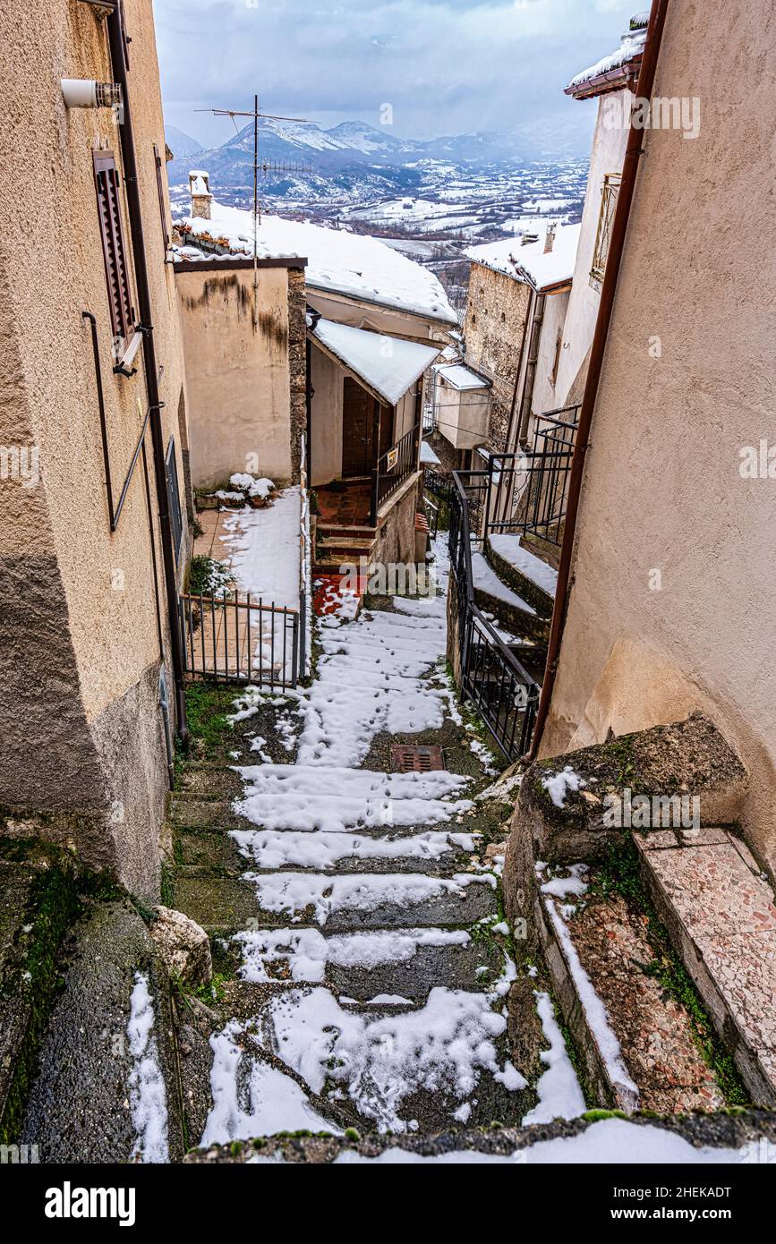 Steps, alleys and snow-white roofs in the small mountain town of ...