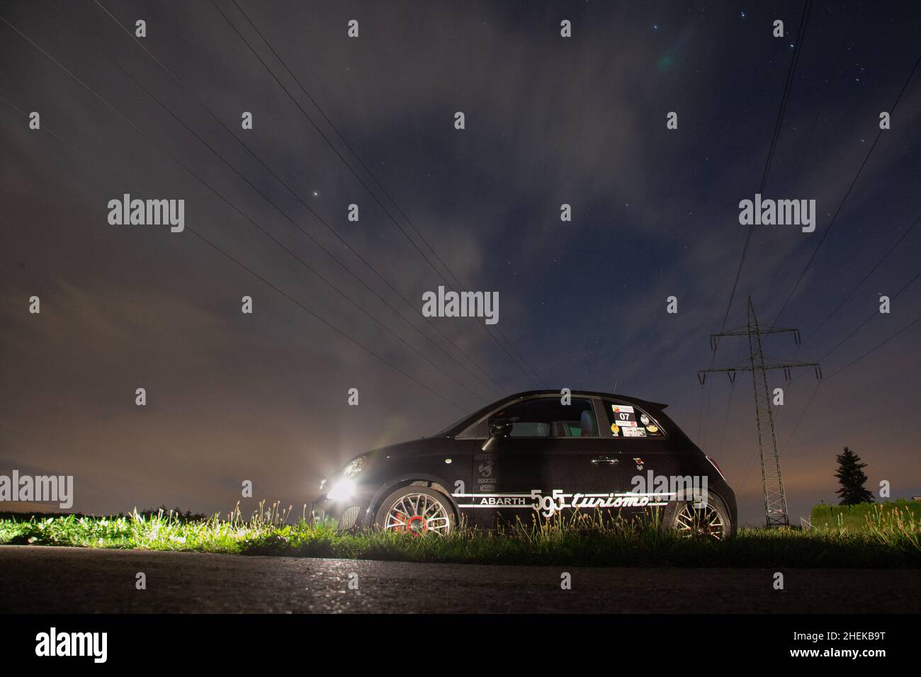 Black Abarth 595 turismo after sunset. --- Abarth & C. S.p.A. is an ...