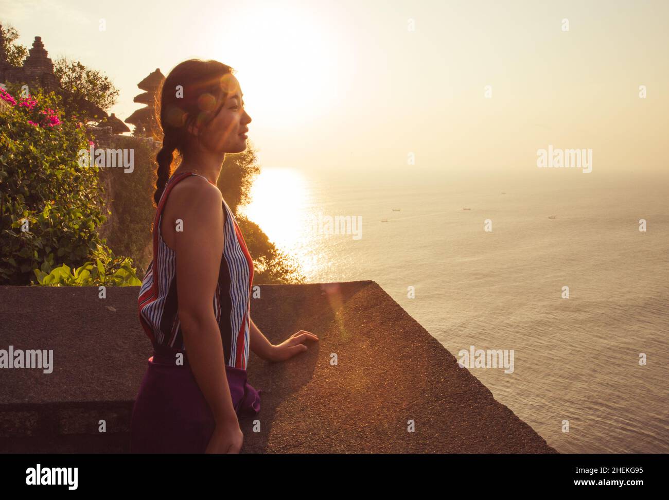 Girl Sitting Alone In Sunset