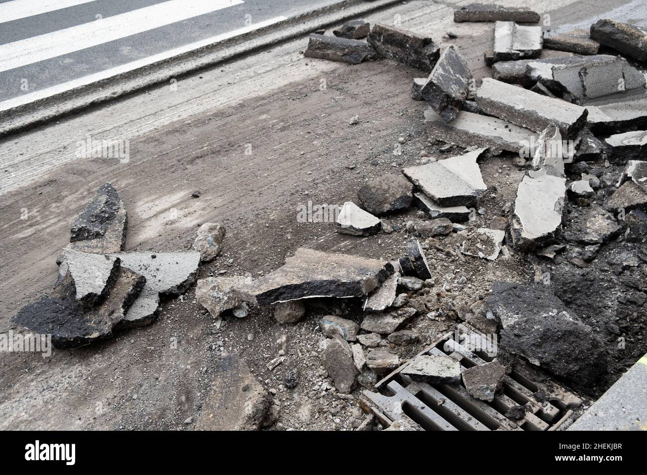 City street asphalt demolition for reconstruction, Crushed top layer ...