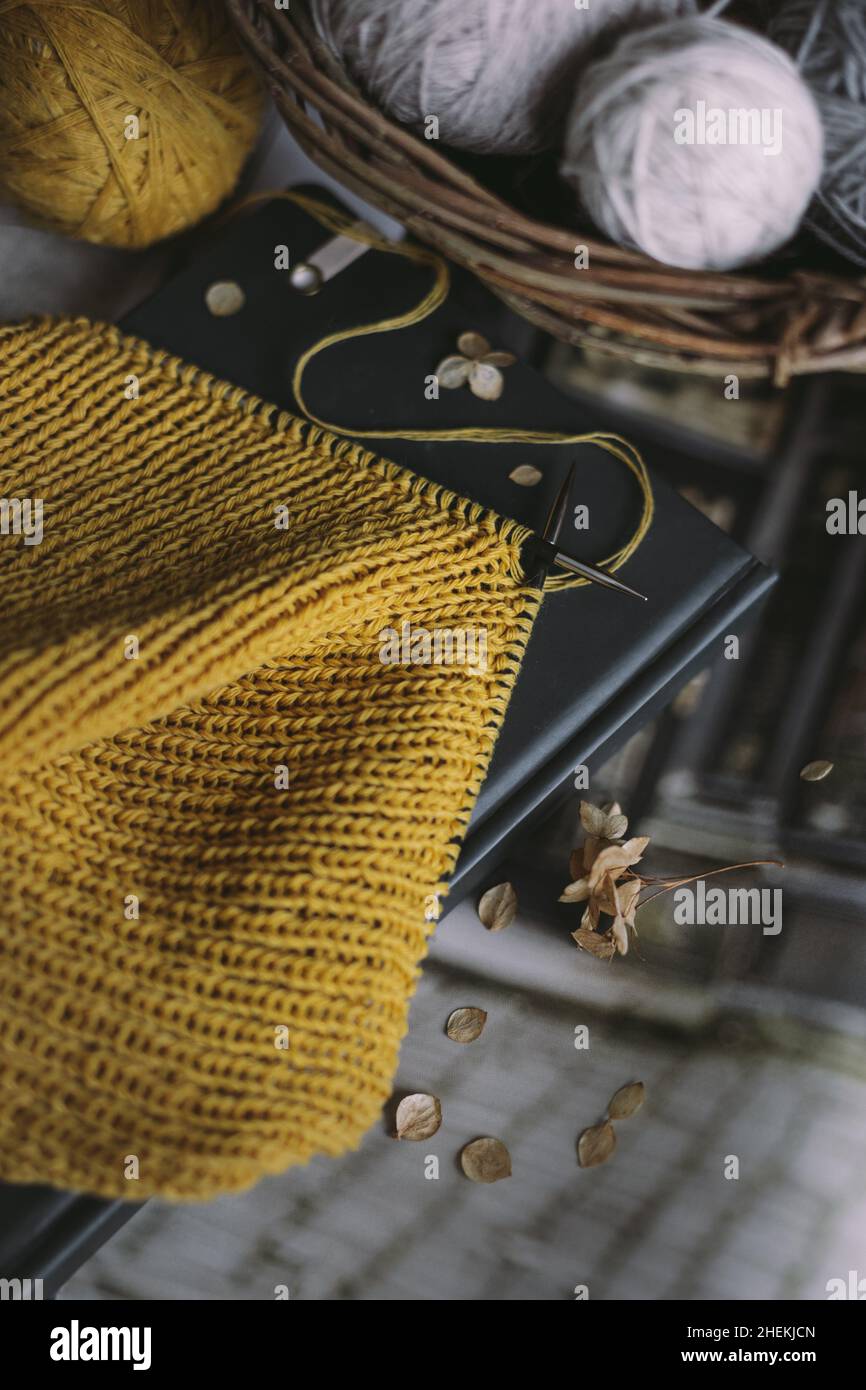 Hand knitting with needles and yarn balls. Concept for handmade and ...