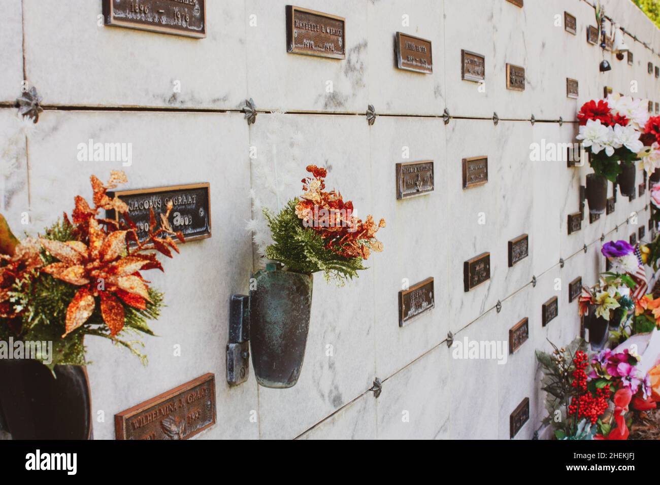 A mausoleum wall in a cemetery Stock Photo - Alamy
