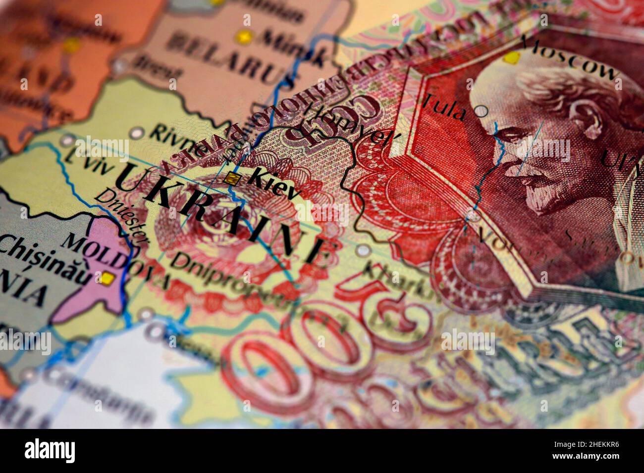 Close up of a Russian ruble banknote on top of a map of Ukraine Stock ...