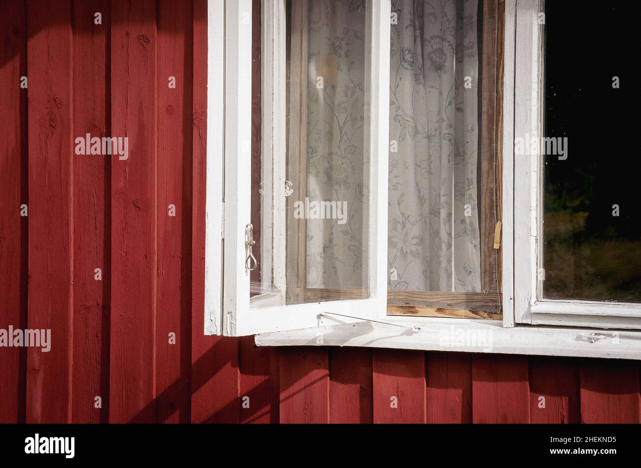 Symbolic image: Window detail of a wooden house in the style of a ...