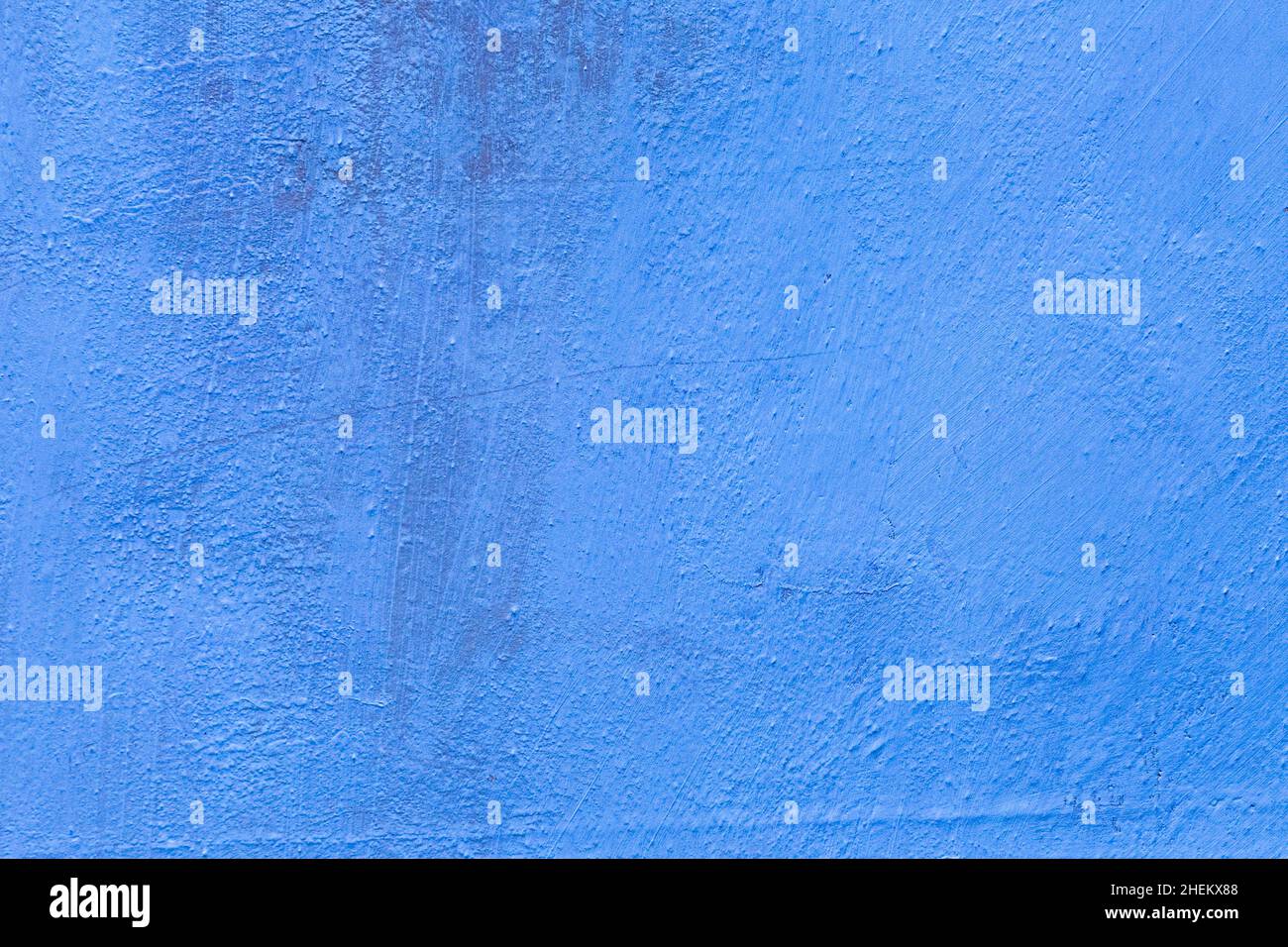 old cracked blue plaster wall in detail Stock Photo - Alamy