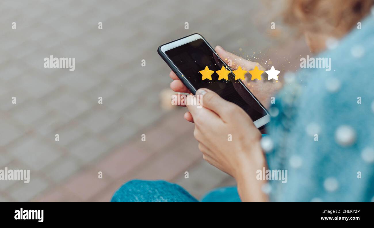 Customer review good rating concept.Excellent. Person using mobile ...