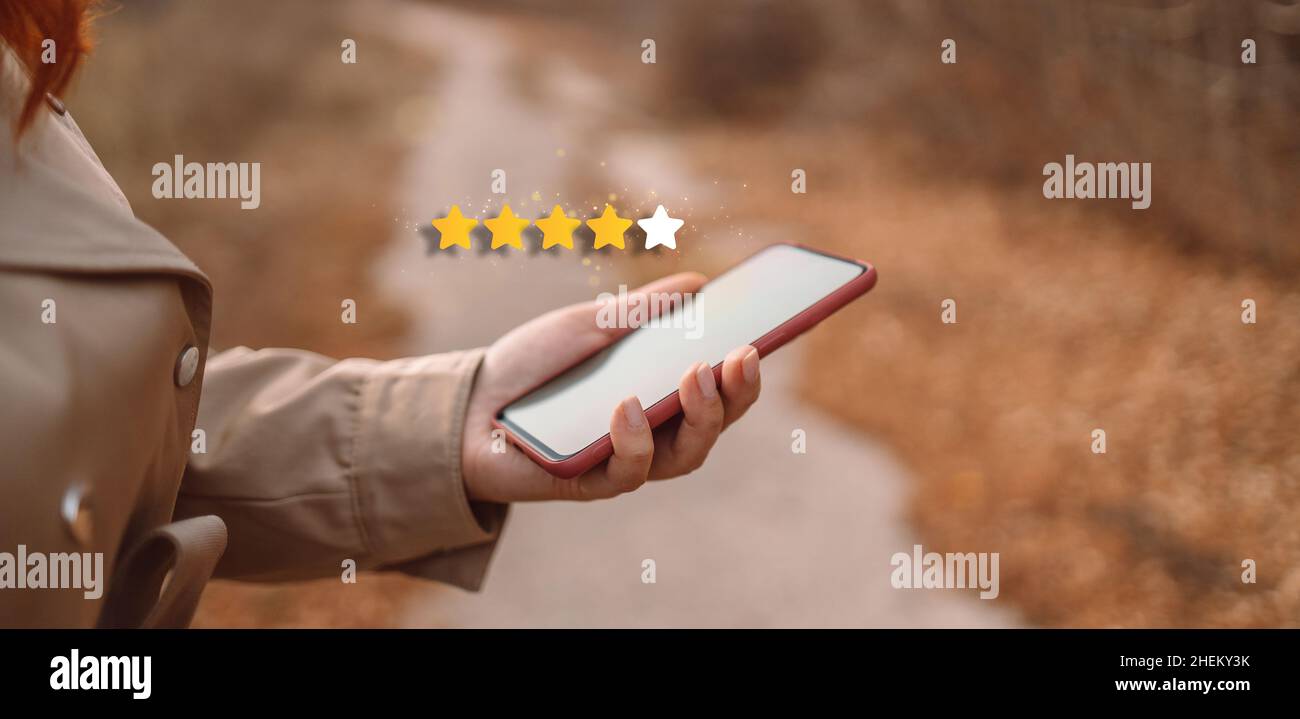 Customer review good rating concept.Excellent. Person using mobile ...
