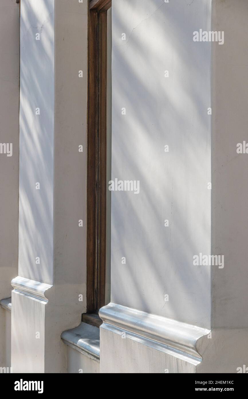 A detail of squared columns in angular light Stock Photo - Alamy
