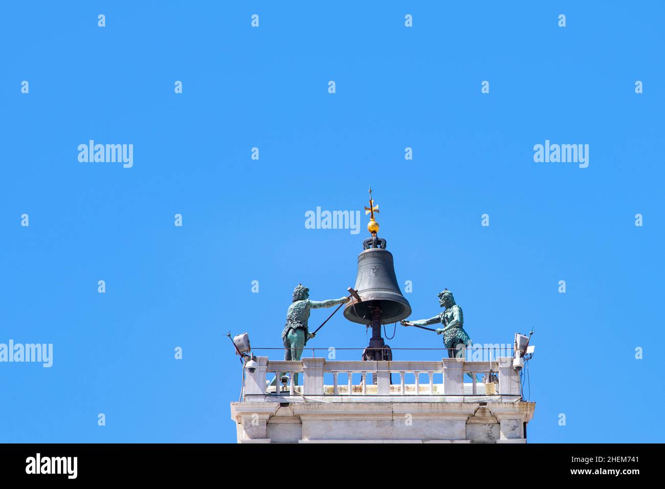 clock tower in Venice with hammering statues in Venice, Italy Stock ...