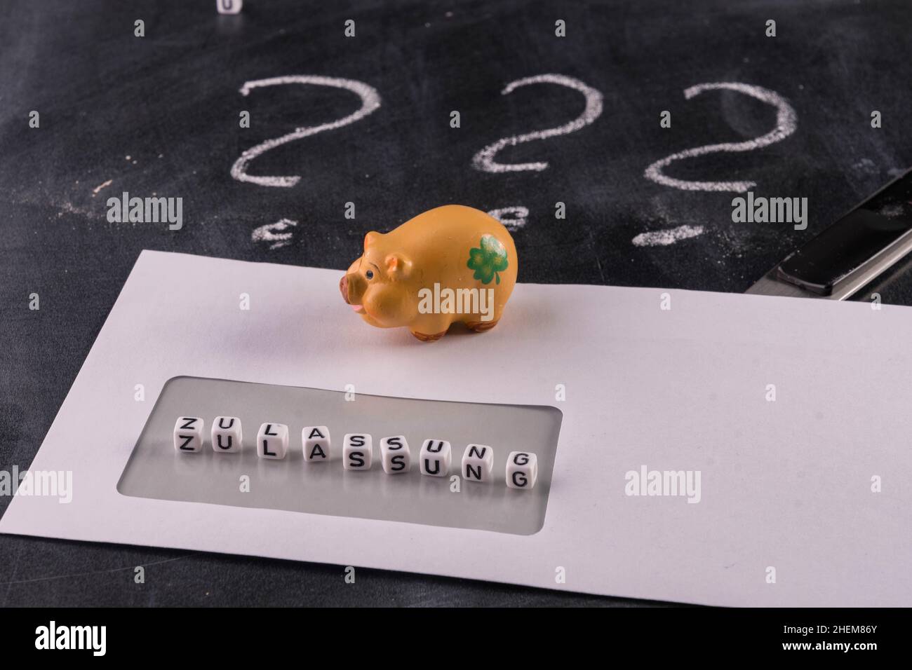 Admission lucky pig question mark Stock Photo - Alamy