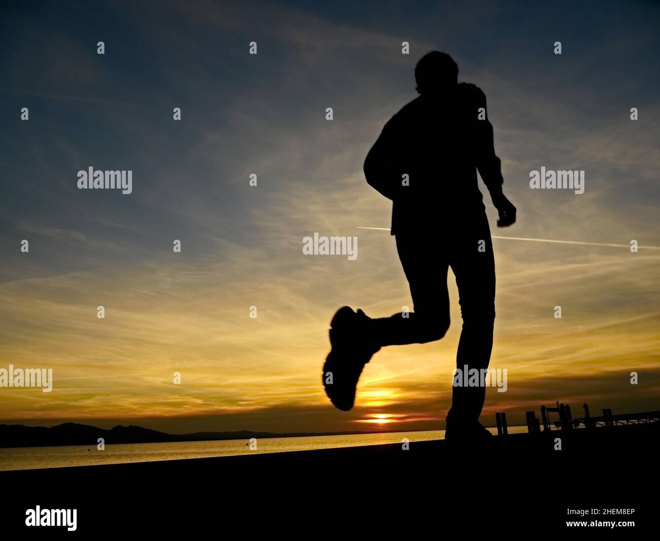silhouette of a jogger Stock Photo - Alamy