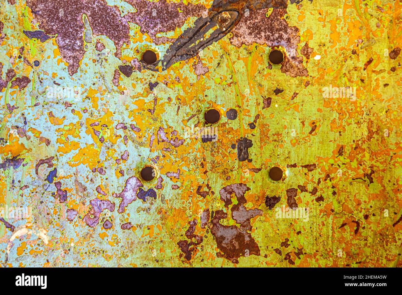 colorful bright background of old grunge metl plate in different colors ...