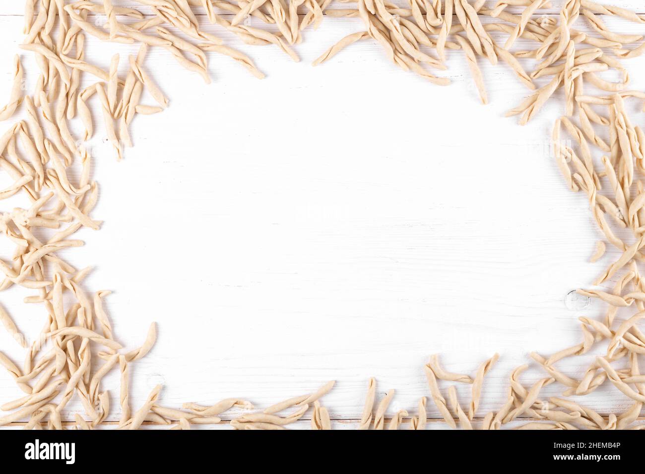 Frame of whole grain wheat raw apulian pasta called Pizzarieddi or ...
