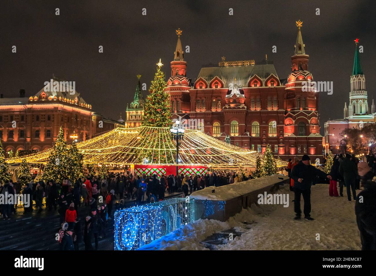 New Year in Moscow near Red Square. Decorated buildings and a tree with ...